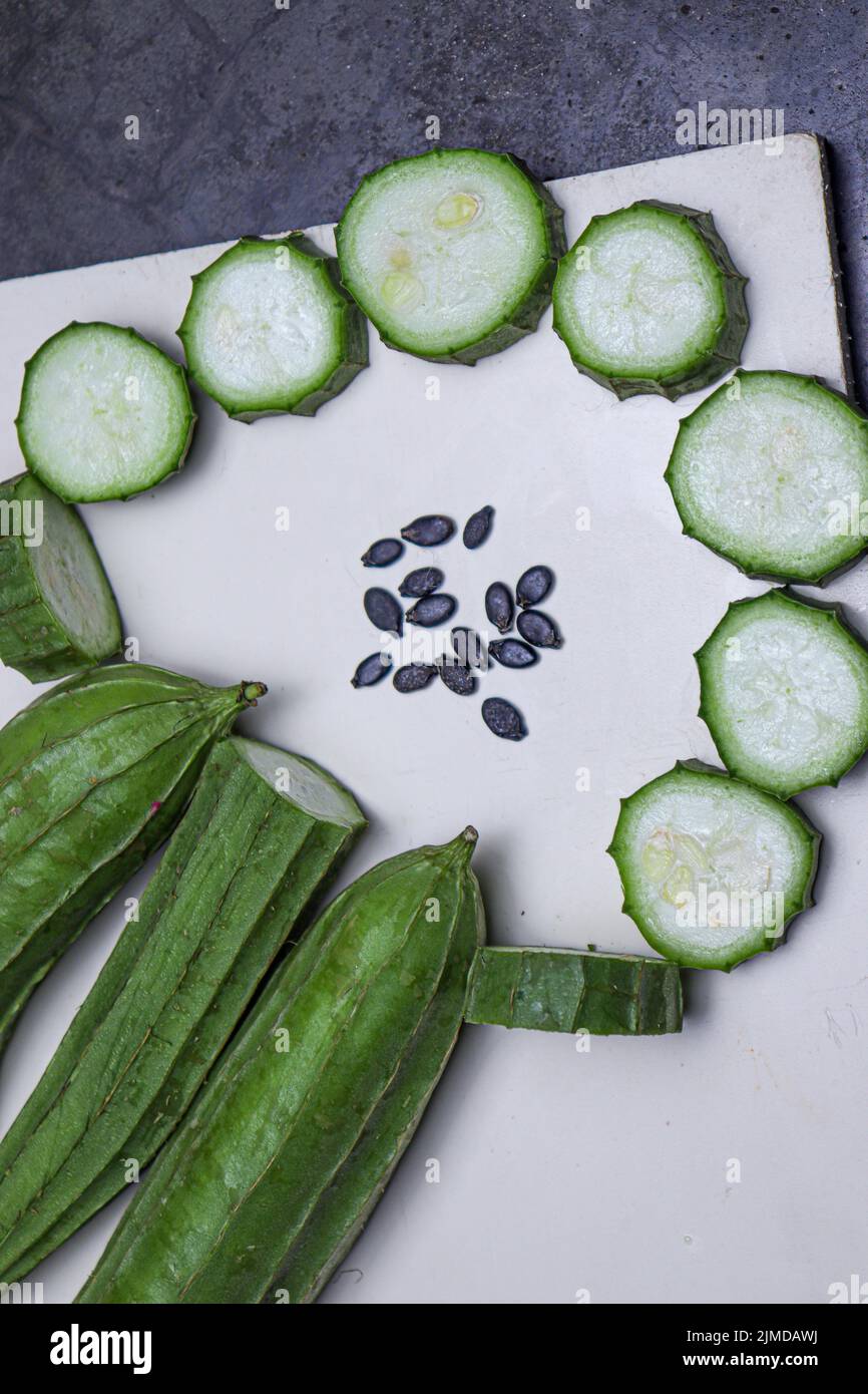 Ridges Gourd stock with seed on farm for farming Stock Photo - Alamy