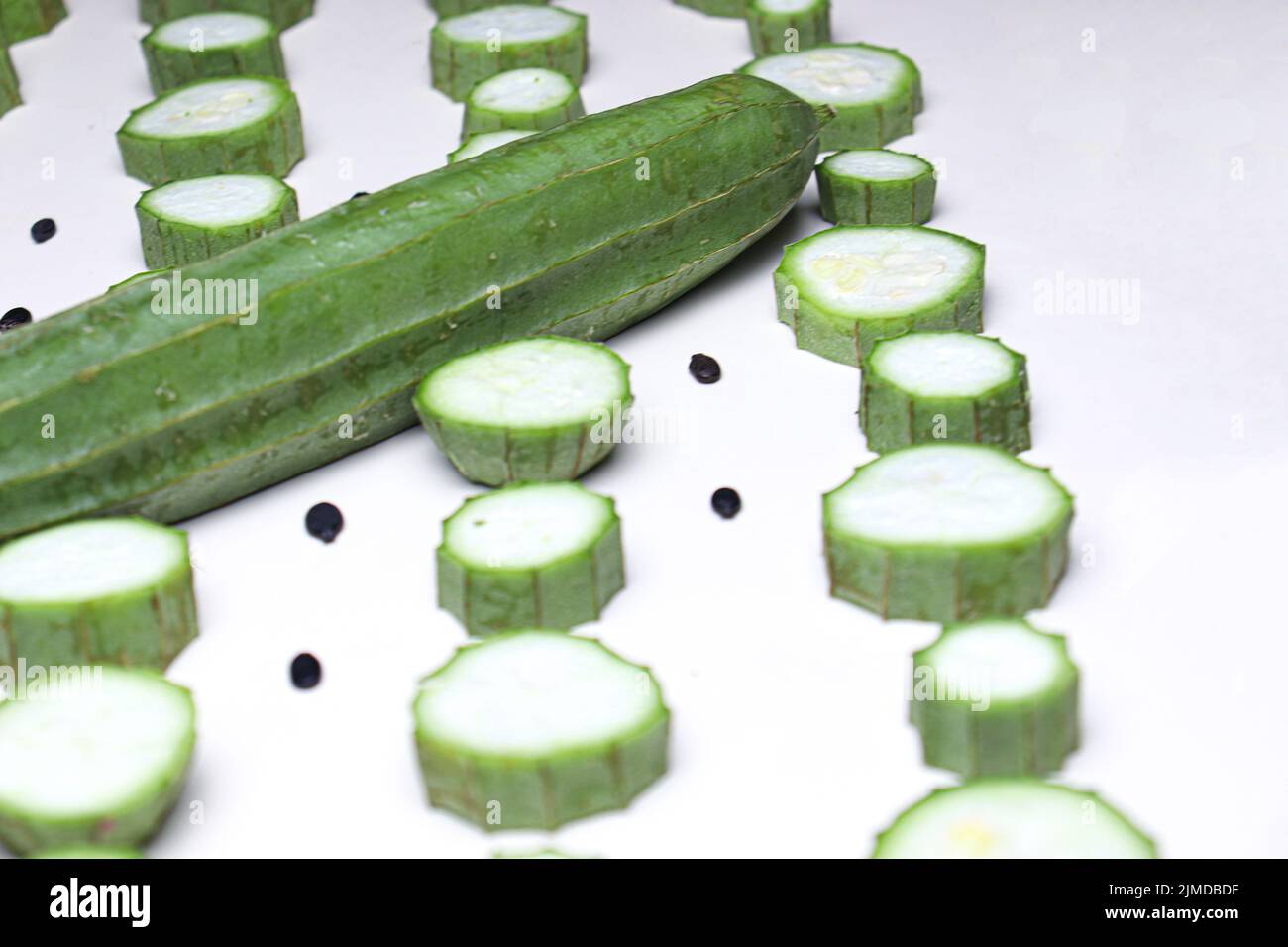 Ridges Gourd stock with seed on farm for farming Stock Photo - Alamy