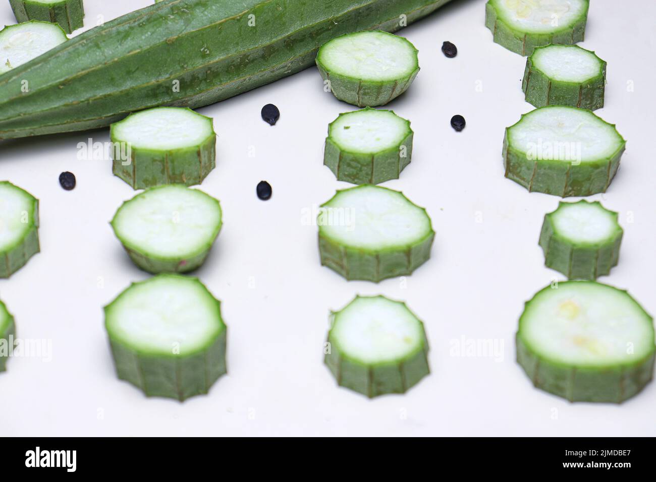 Ridges Gourd stock with seed on farm for farming Stock Photo - Alamy