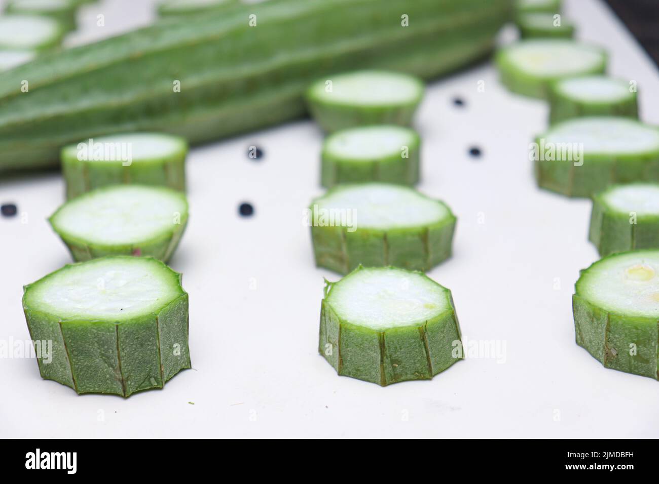 Ridges Gourd stock with seed on farm for farming Stock Photo - Alamy