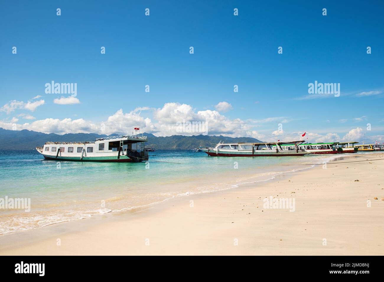 Daytime view from the beach to boats Stock Photo - Alamy