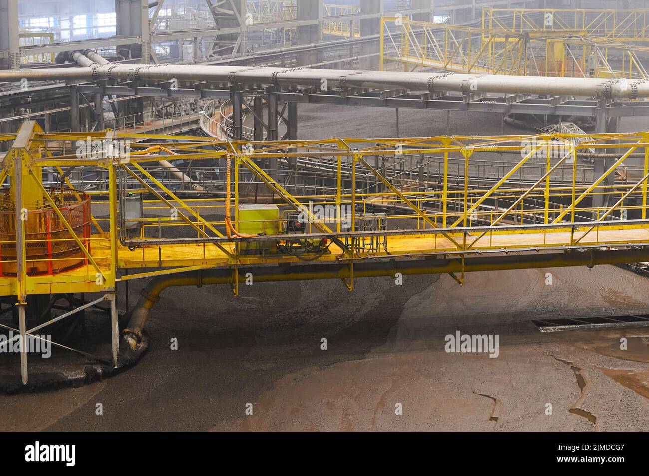 Huge container to separate liquid pulp material in workshop Stock Photo ...