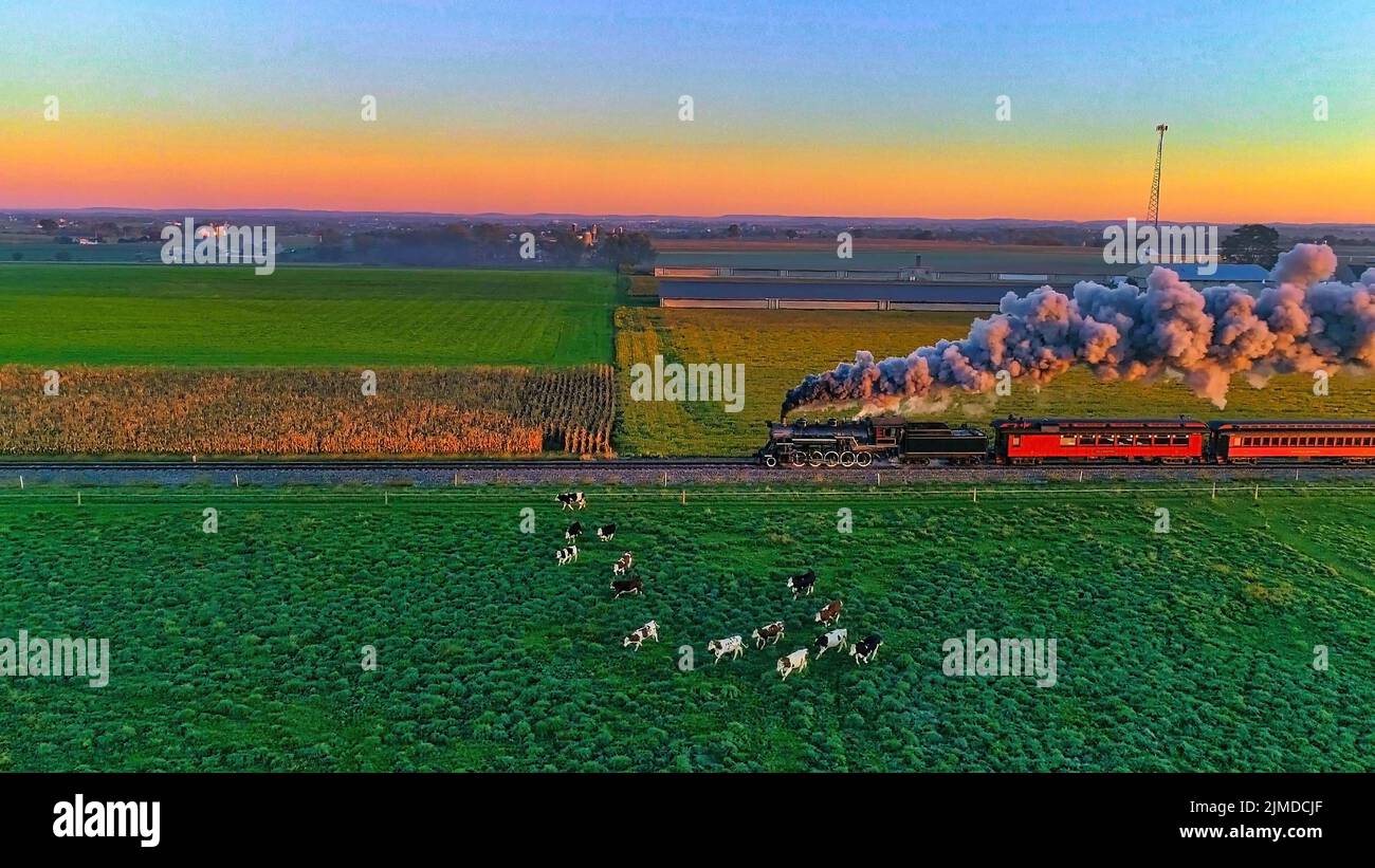 Aerial View of Steam Passenger Train at Sunrise Stock Photo - Alamy