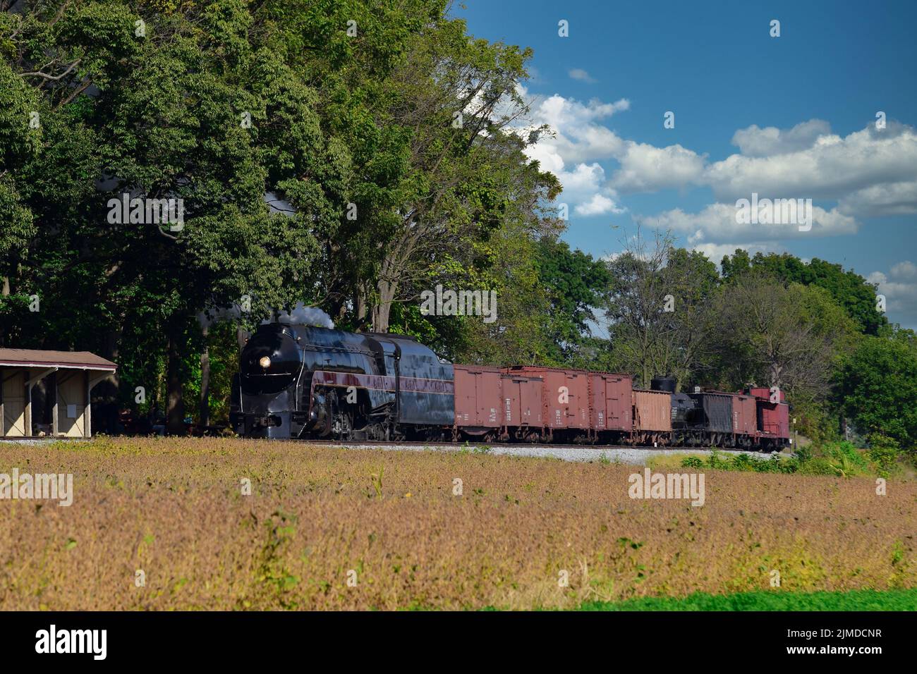 Antique Steam Freight Train Puffing Smoke and Steam Stock Photo - Alamy