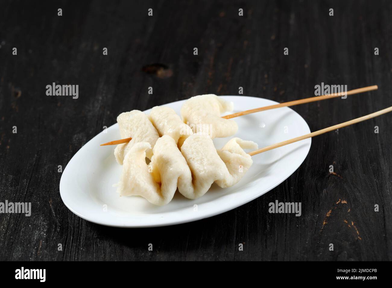 Oemuk Korean Fish Cake Skewer on White Plate, Copy Space Stock Photo ...