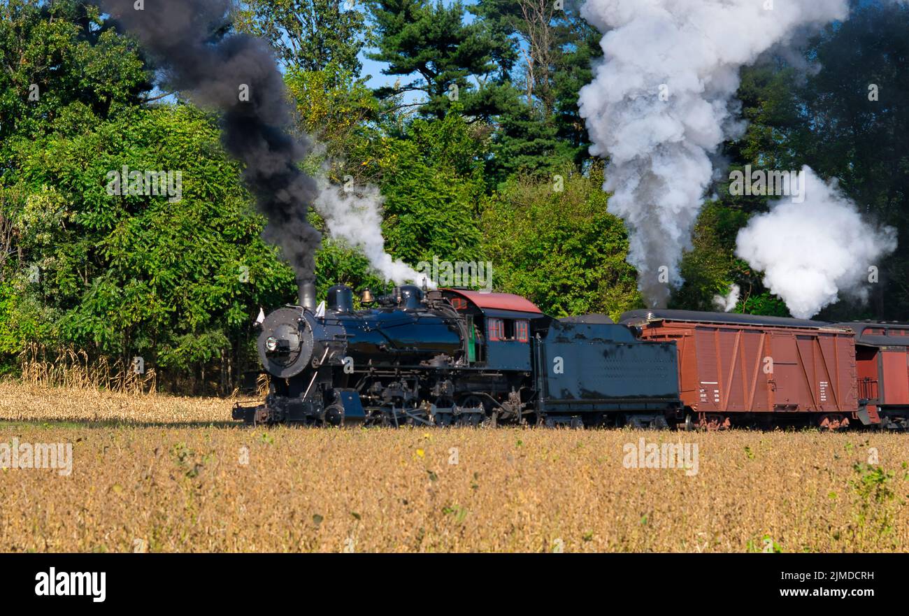 Antique Steam Freight Train Puffing Smoke and Steam Stock Photo - Alamy