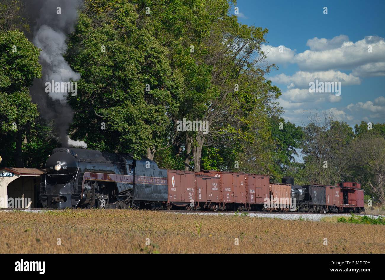 Antique Steam Freight Train Puffing Smoke and Steam Stock Photo - Alamy