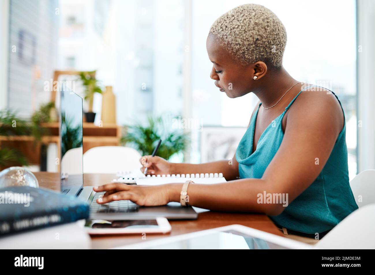 Serious hard working blonde female hi-res stock photography and images ...