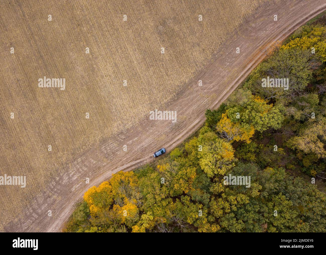 Aerial flight above dirt road hi-res stock photography and images - Alamy
