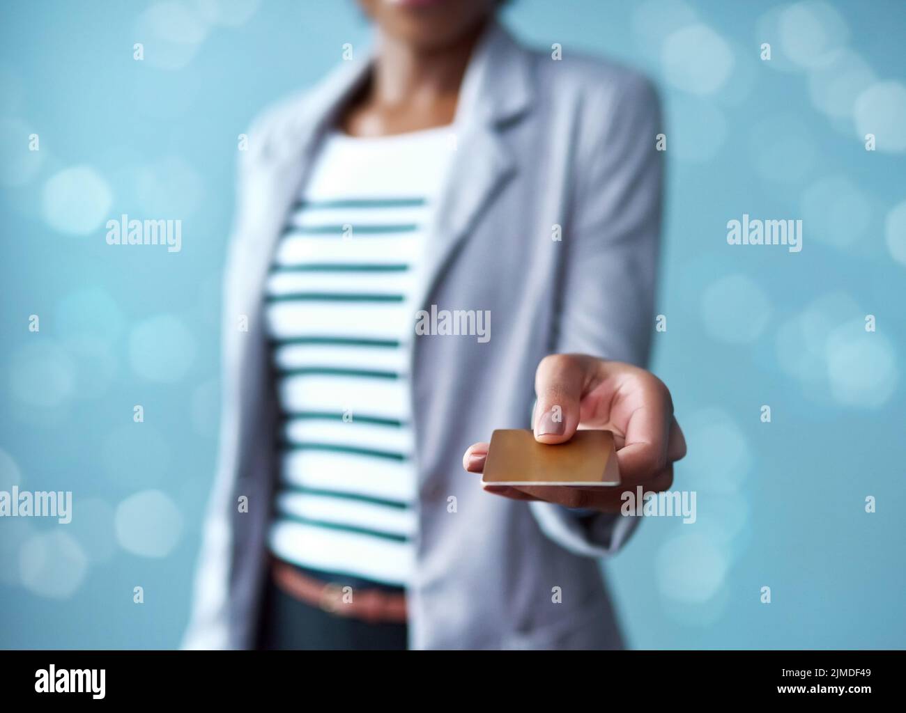 Credit card in the hands of a finance business woman paying, buying and ...