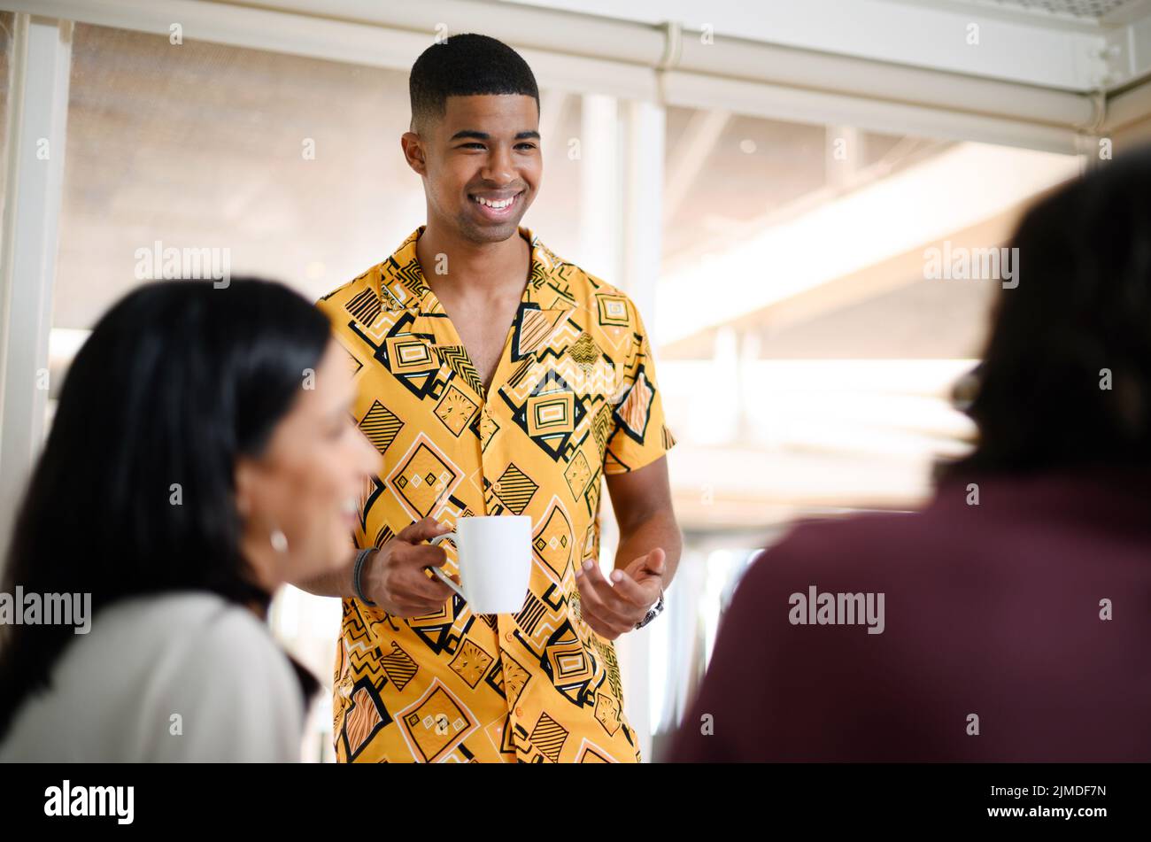 Hes leadership style is encouraging and inspiring. a young businessman ...