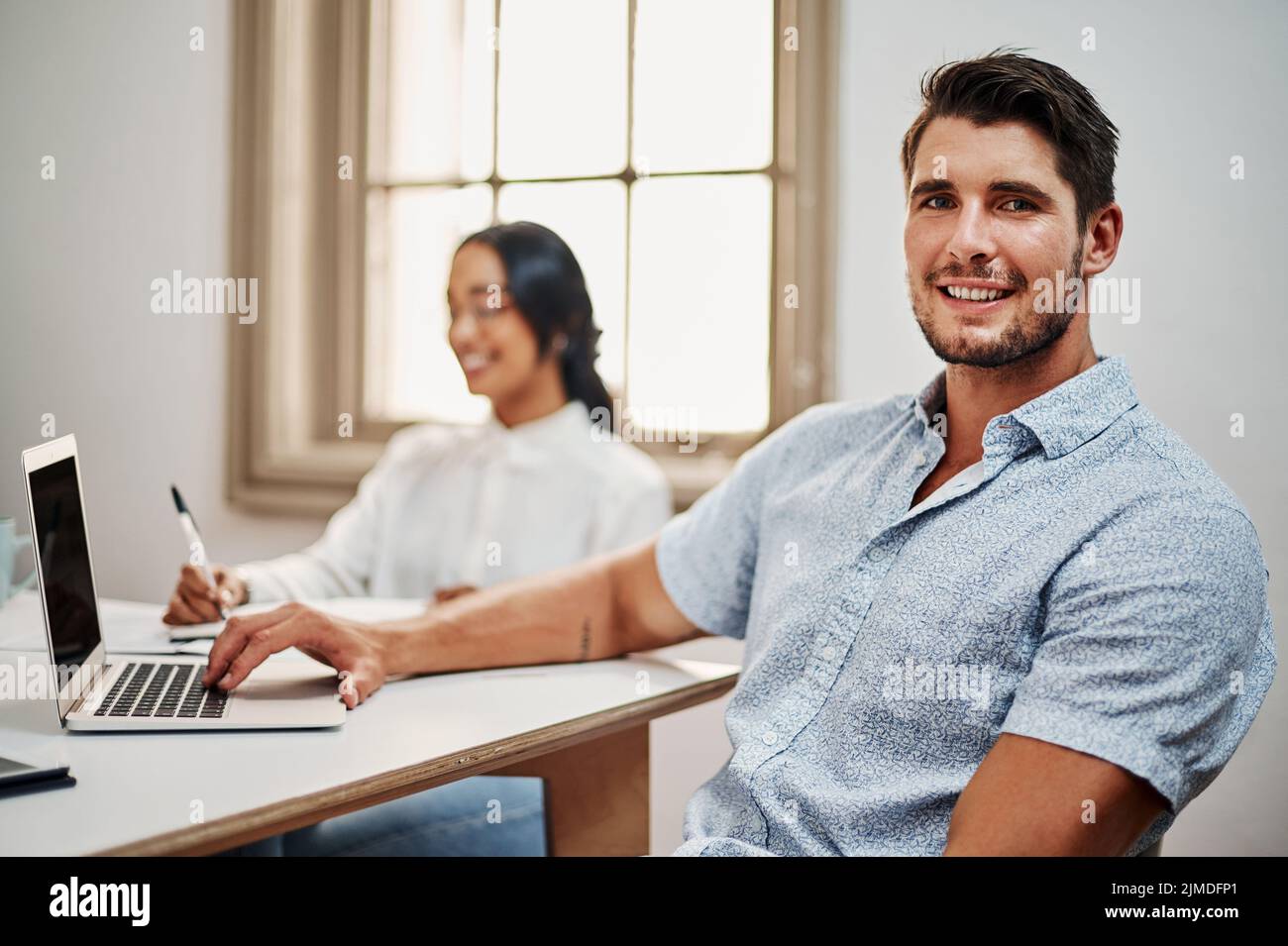 We want success and were going to get it. Portrait of a young businessman having a meeting with ...
