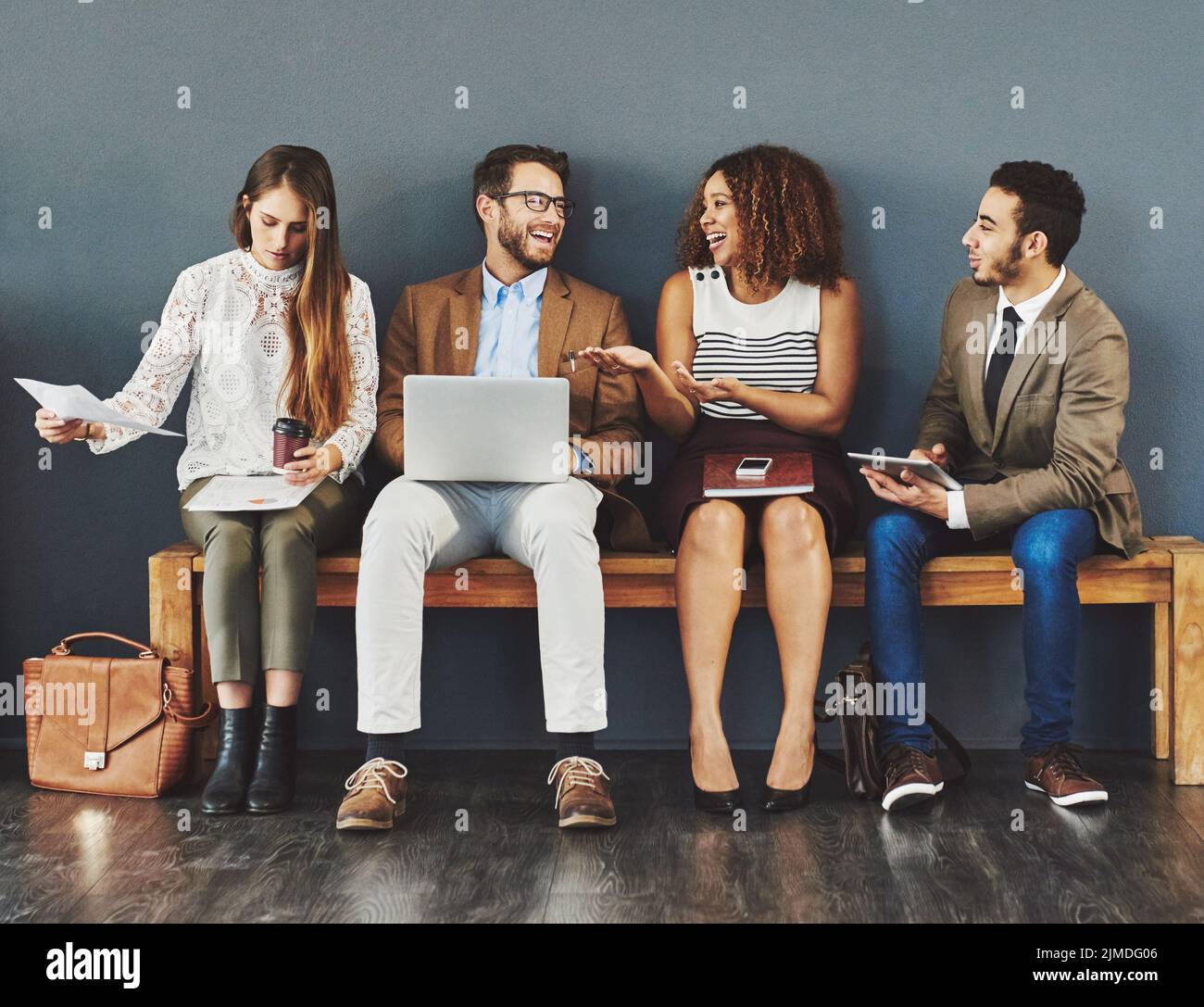 Technology, interview and skills of diverse people waiting in line and ...