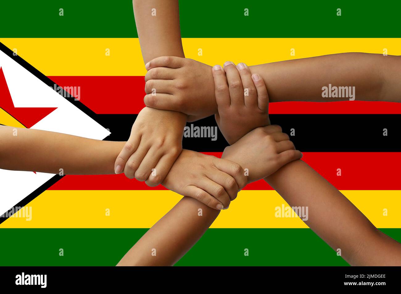 Zimbabwe flag, intergration of a multicultural group of young people ...
