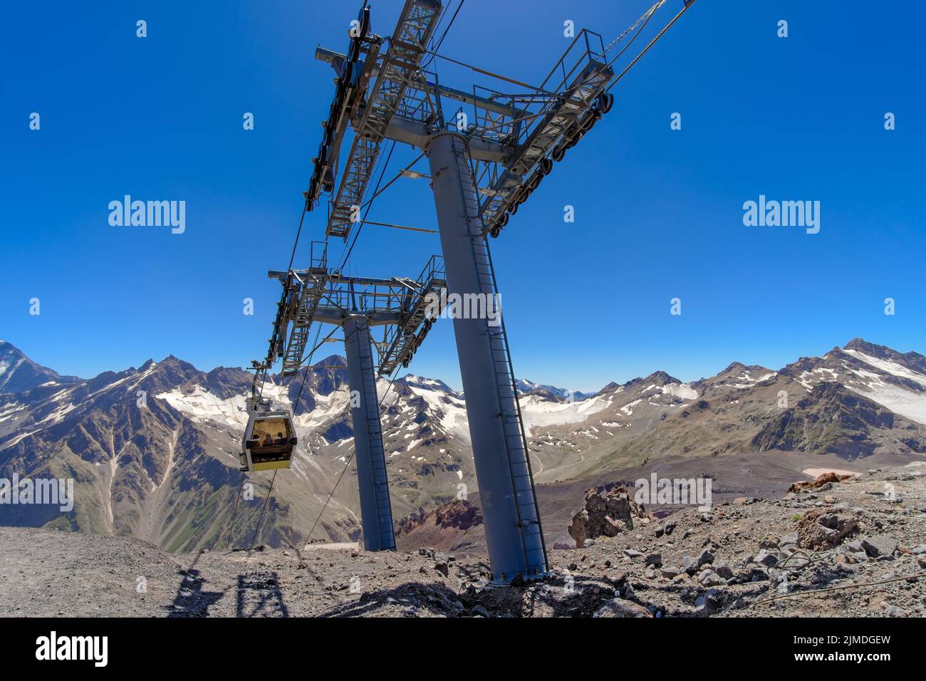 Cable car cabin over a precipice in the mountains Stock Photo - Alamy
