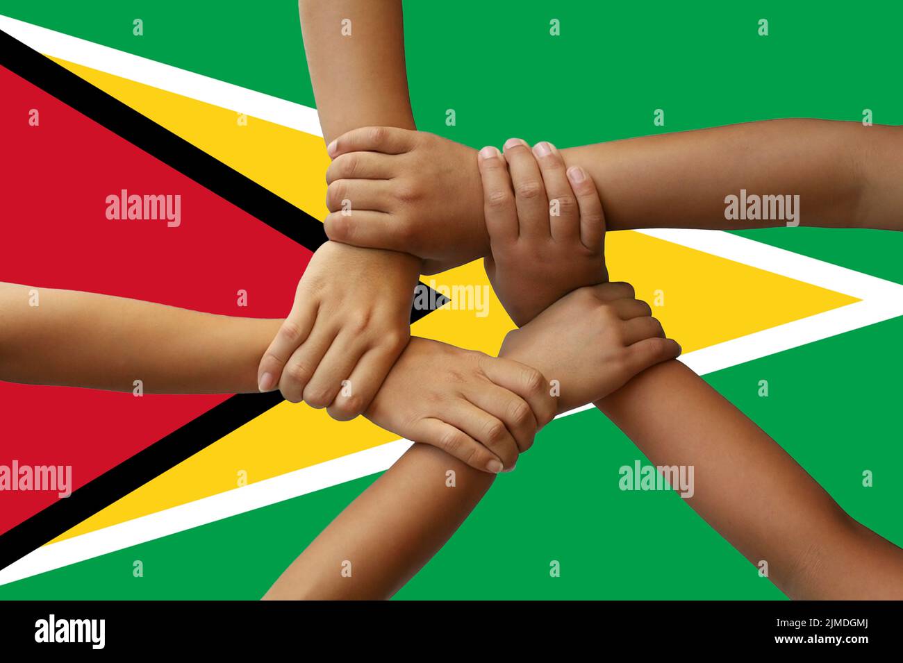 Flag of Guyana, intergration of a multicultural group of young people ...