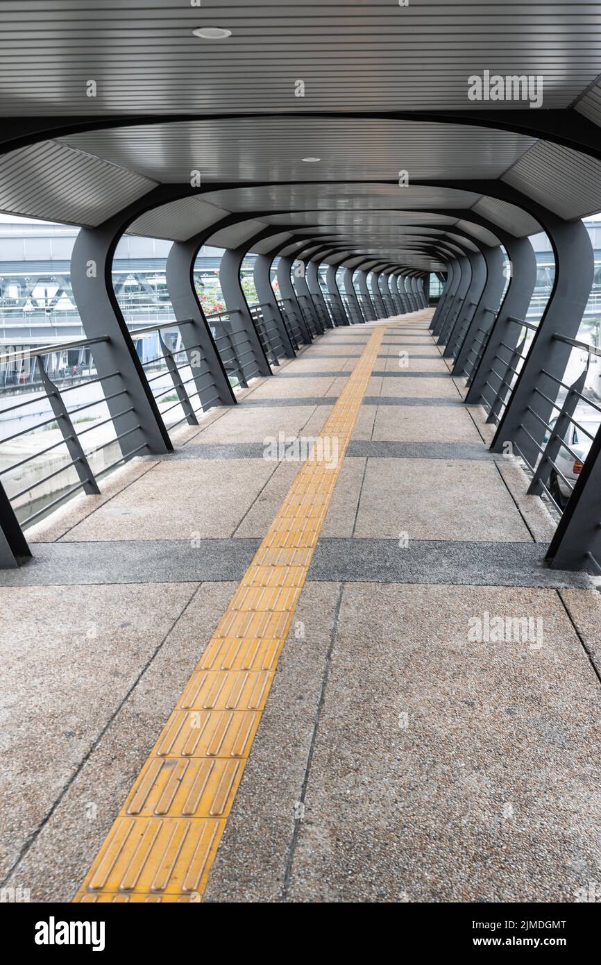 Pedestrian bridge in Kuala Lumpur city Stock Photo - Alamy
