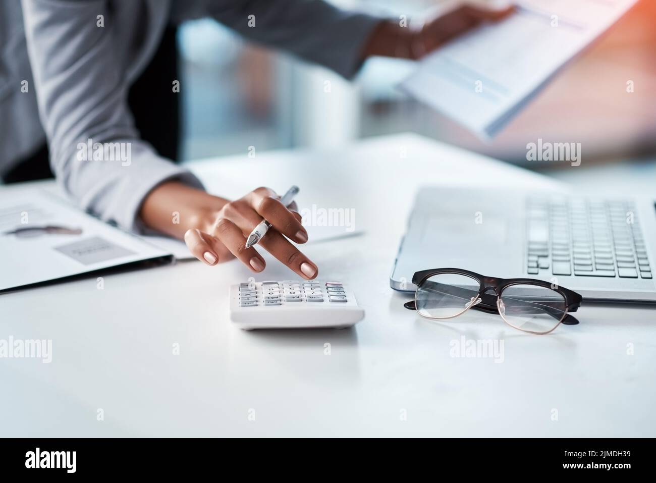 Accountant banker using calculator hi-res stock photography and images ...