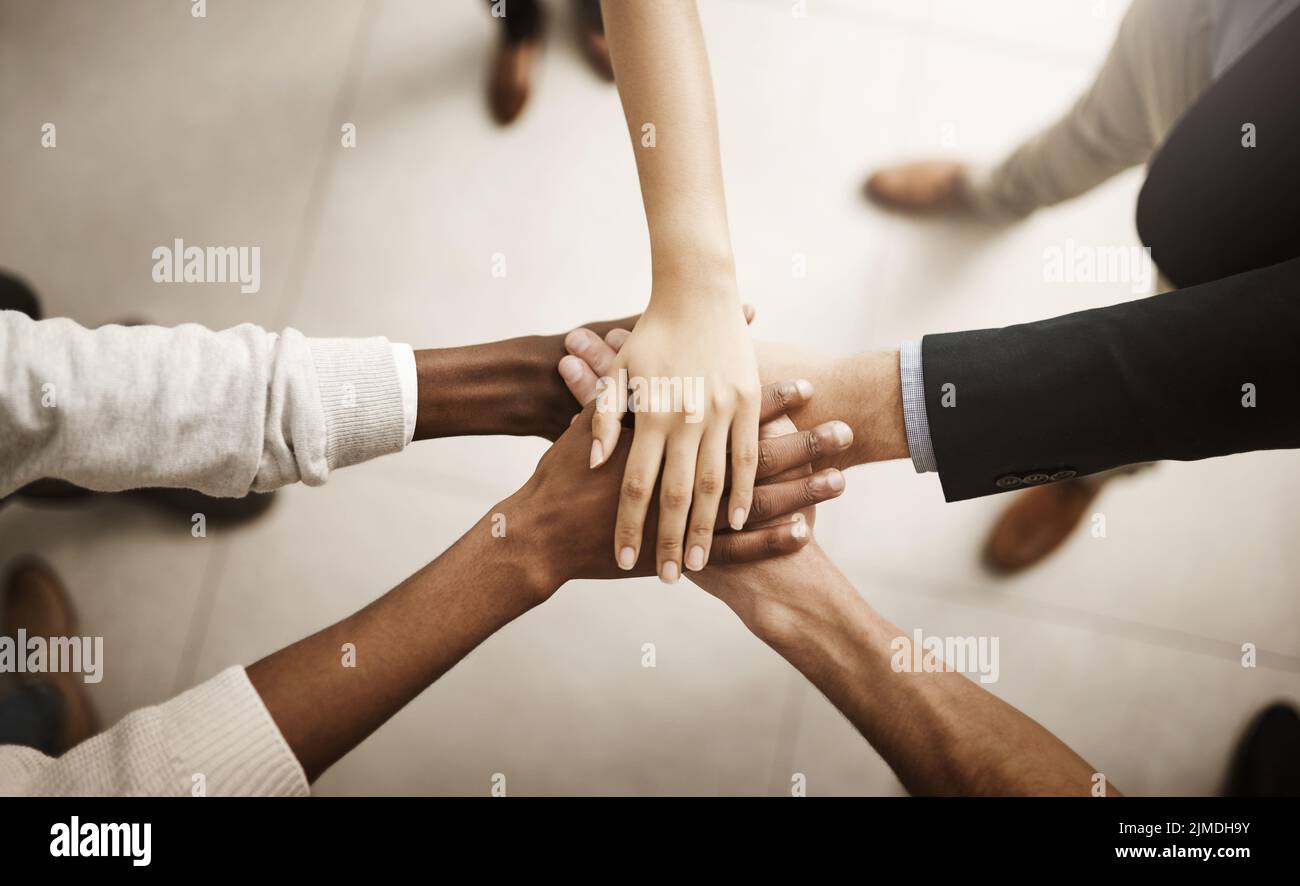 Support, teamworking and joining hands together during team building ...