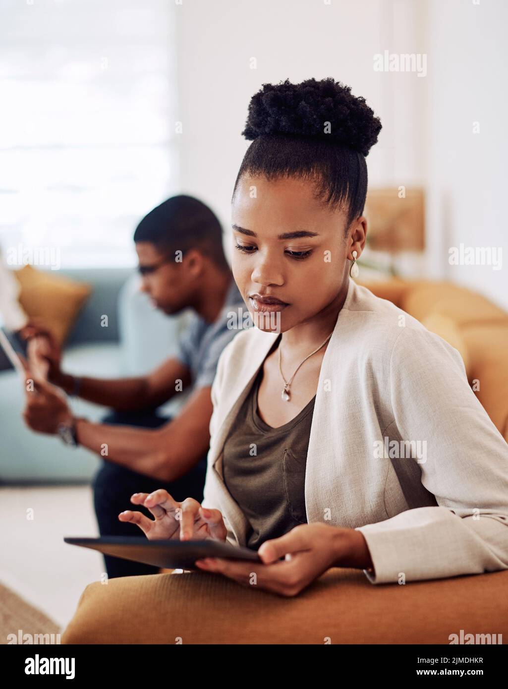 Technology keeps us connected. an attractive young businesswoman ...