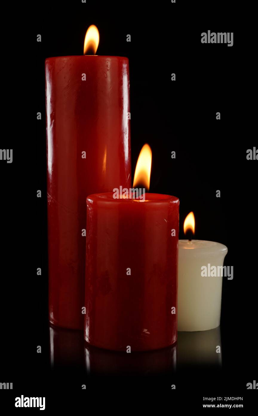 Three Candles Lit Stock Photo - Alamy