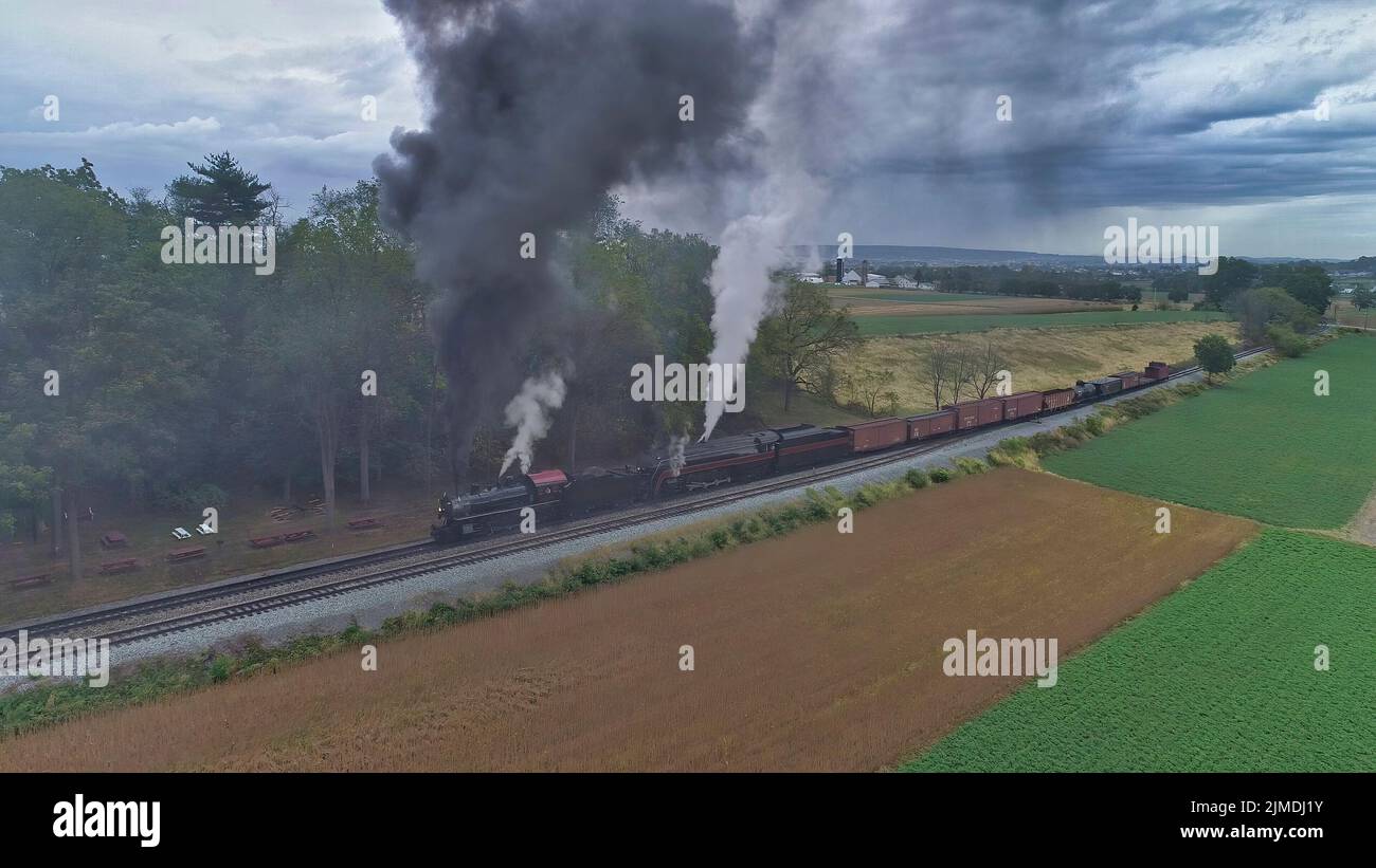 Aerial View of 2 Restored Antique Steam Engines and Double Heading ...