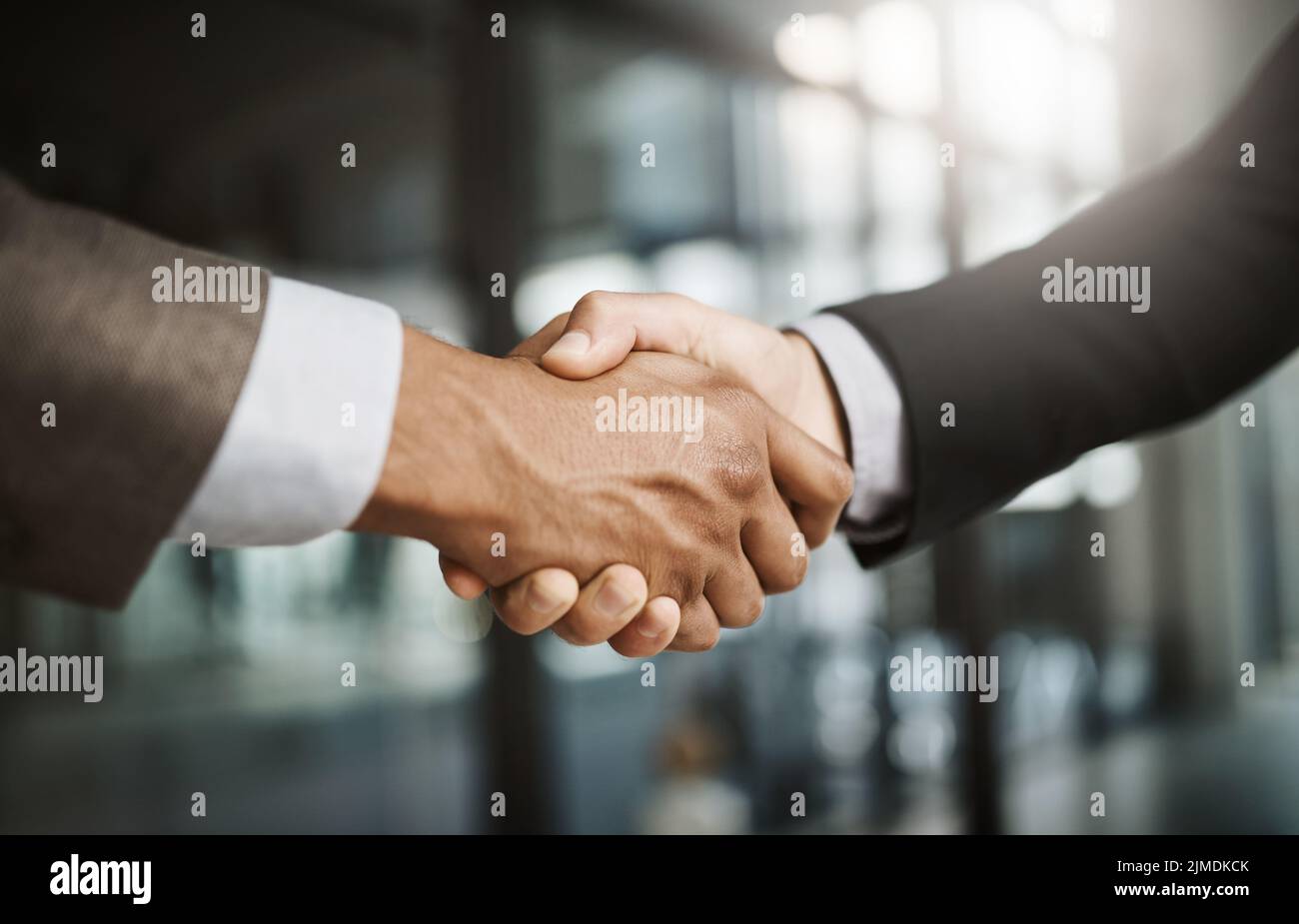 Business men in handshake hand showing success, support and trust ...