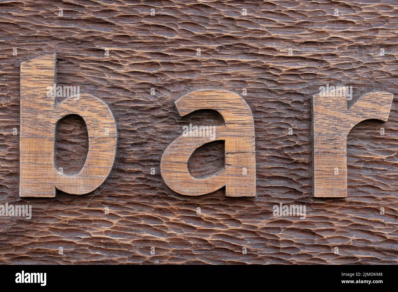 Old carved wood texture. Word Bar Stock Photo - Alamy