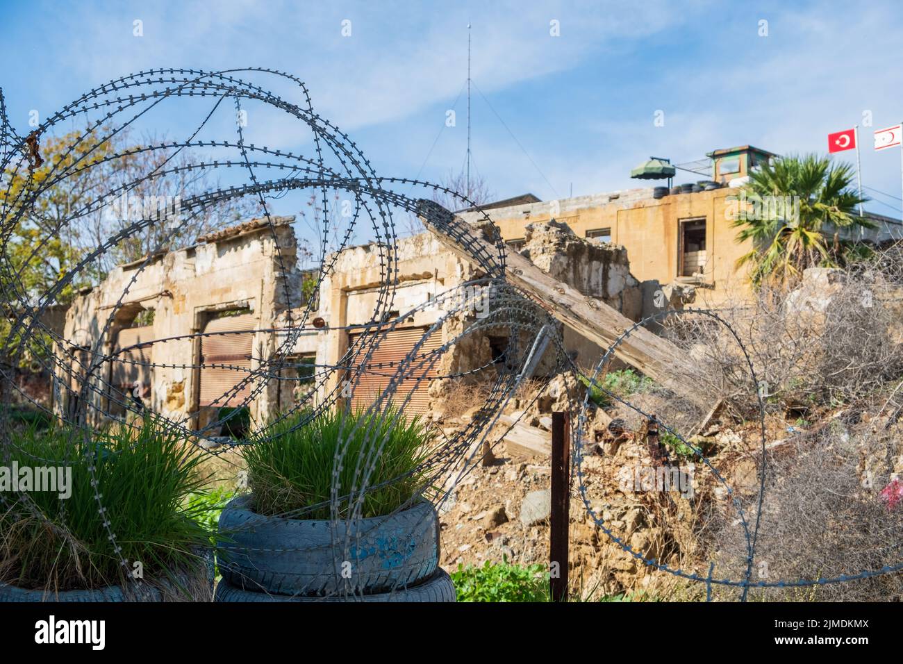 Barbed wire and a sentry post at the UN buffer zone (Green line) in ...