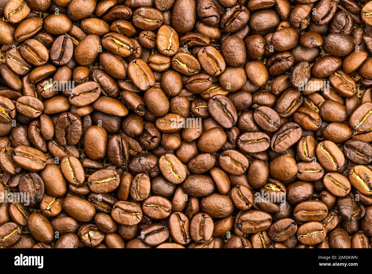 Top view pile of coffee beans on the floor Stock Photo - Alamy