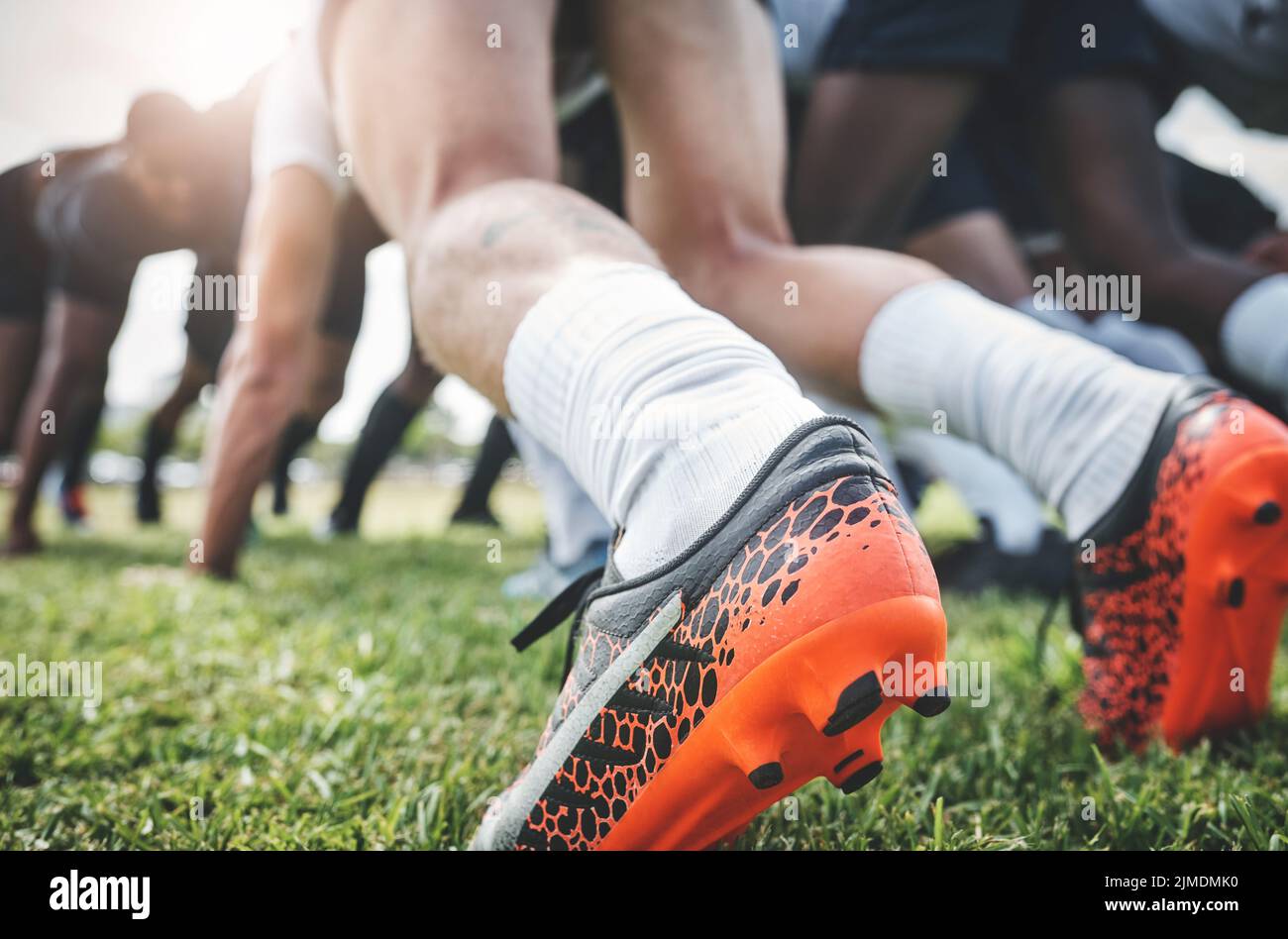 Standing firm on the ground. Low angle shot of two unrecognizable rugby ...