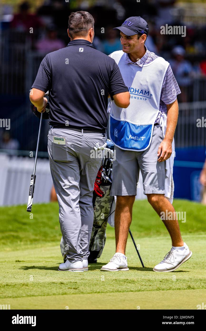 August 5, 2022: Blake McShea celebrates with his caddie after finishing ...