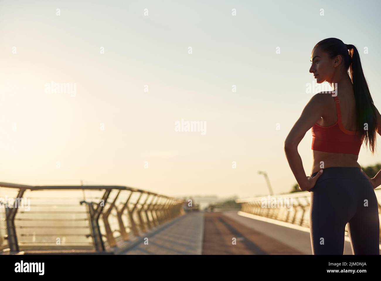 Girl doing sport outdoors in the morning Stock Photo - Alamy