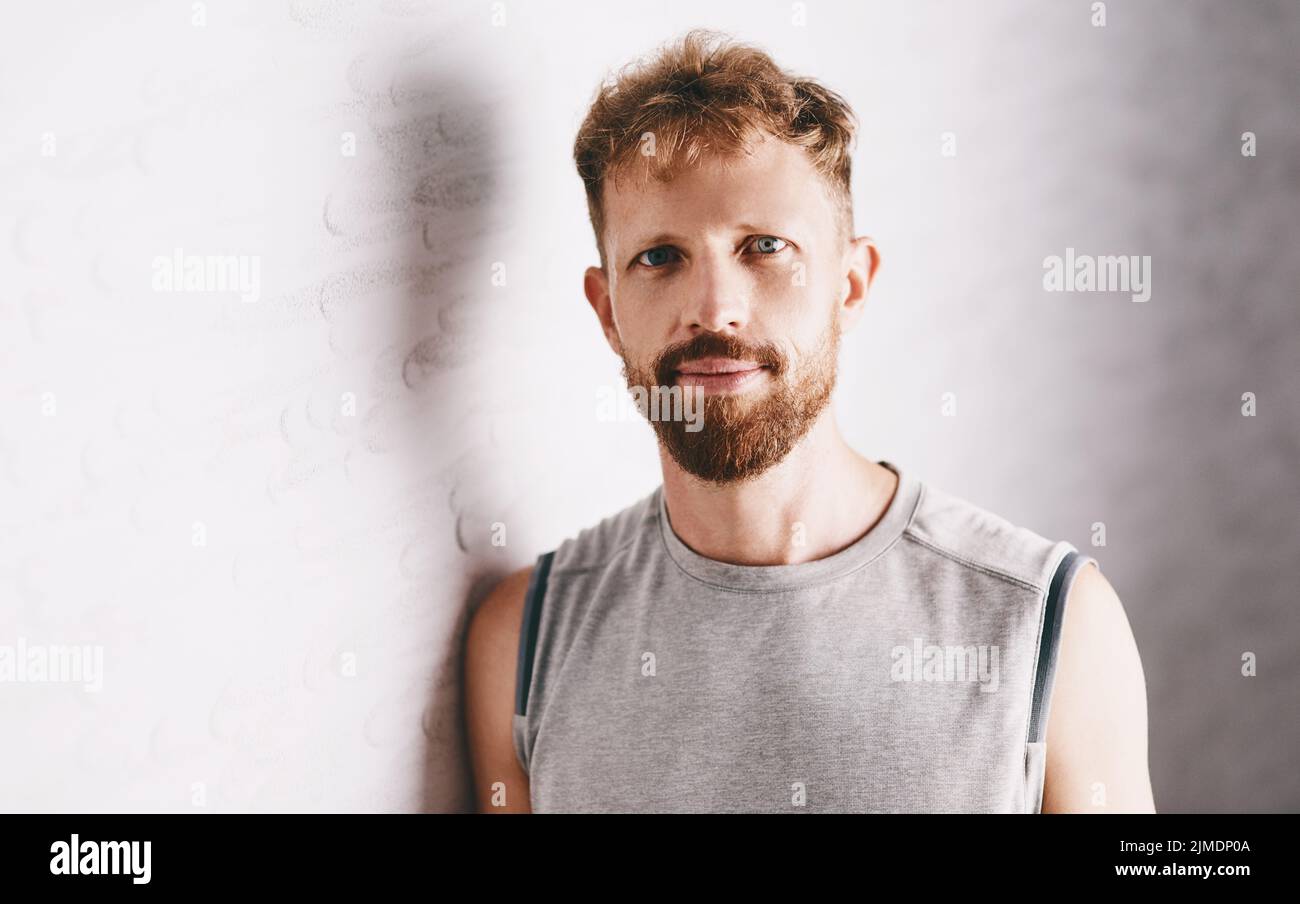 Squash isnt one thing, its everything. Portrait of a young man leaning ...