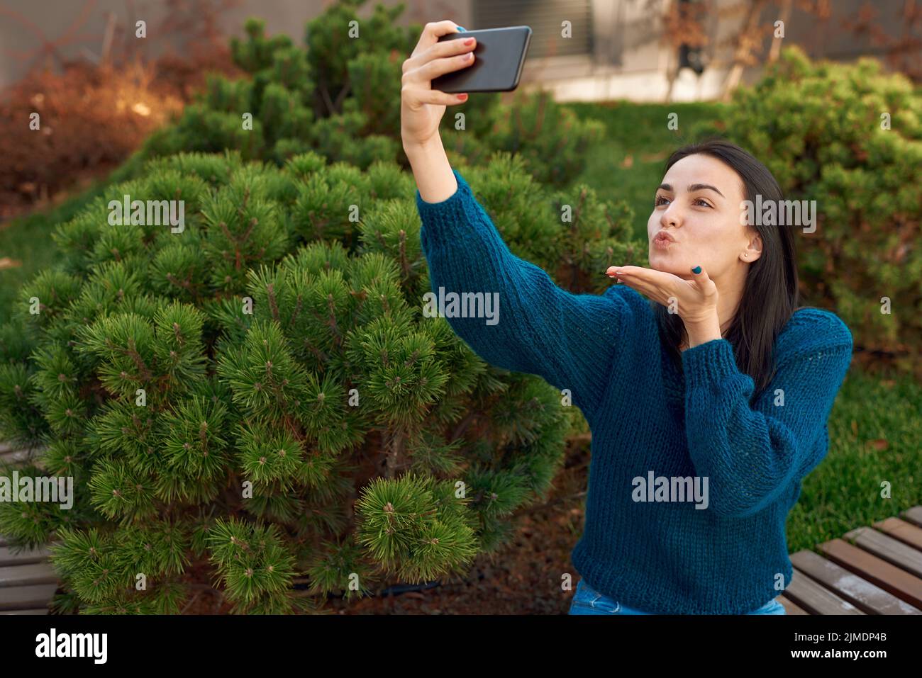 Beautiful woman sending kiss hi-res stock photography and images - Alamy