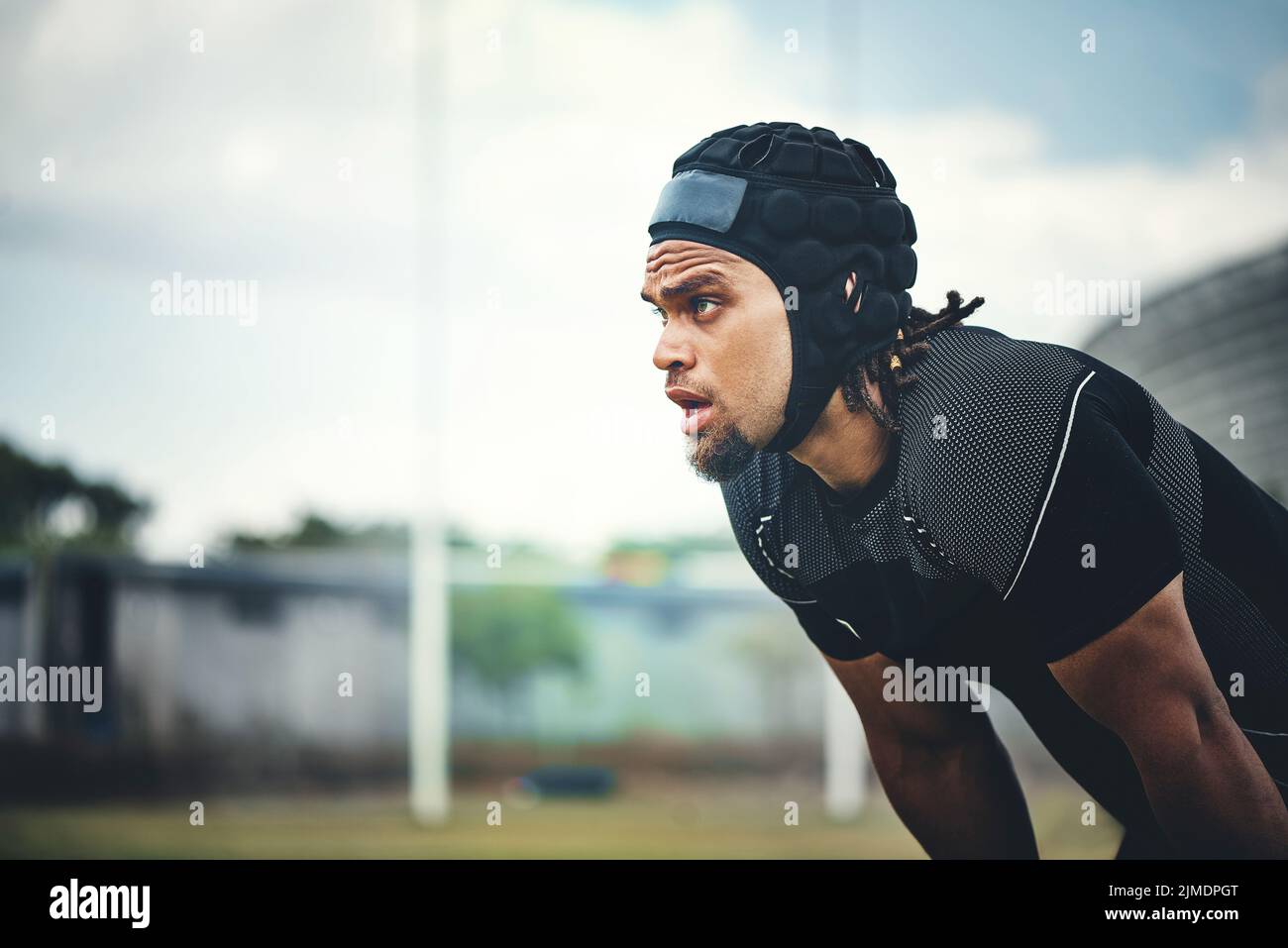 I need to take a little breather. a handsome young rugby player taking ...