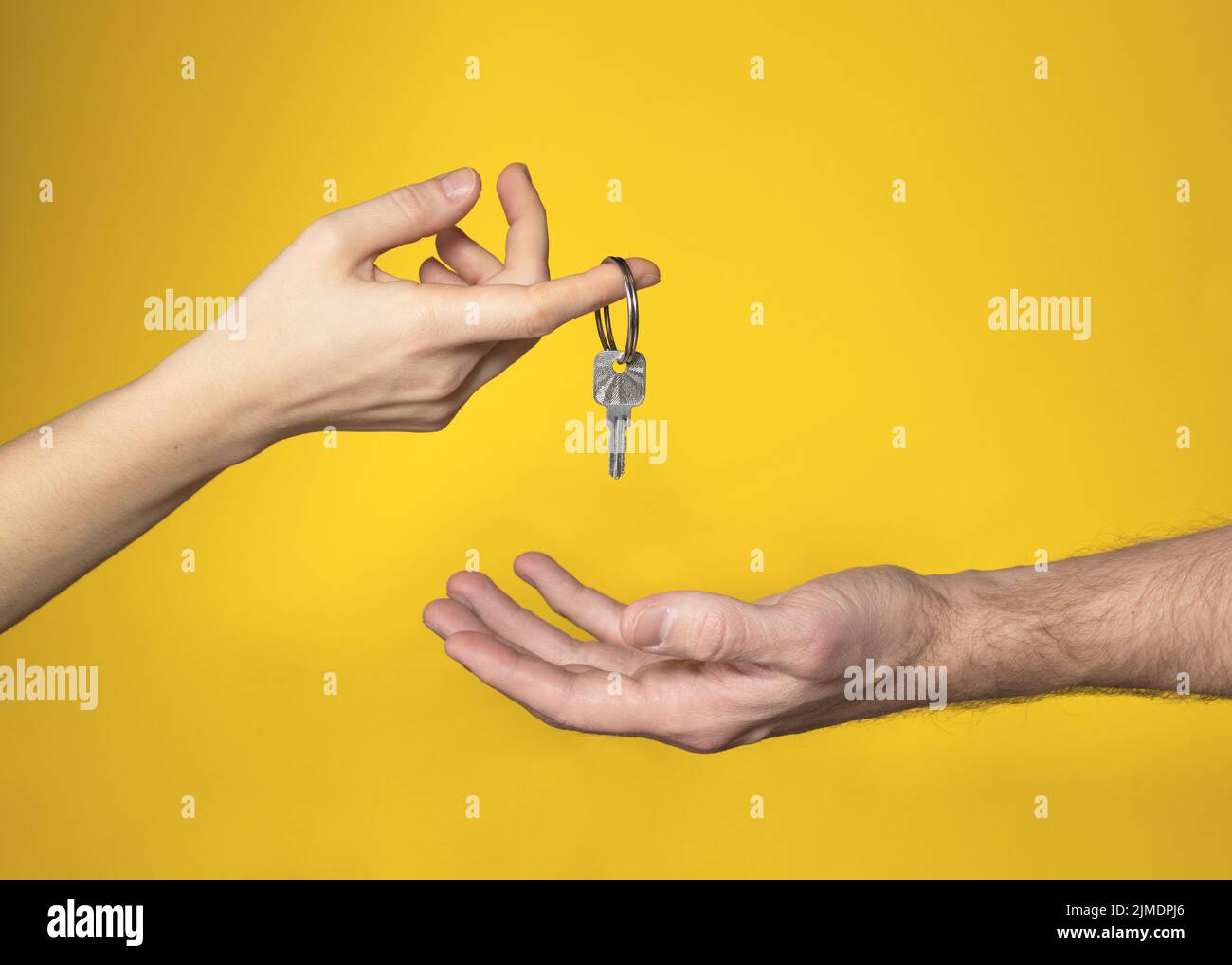 Woman gives man key to her heart. concept of wedding, marriage ...