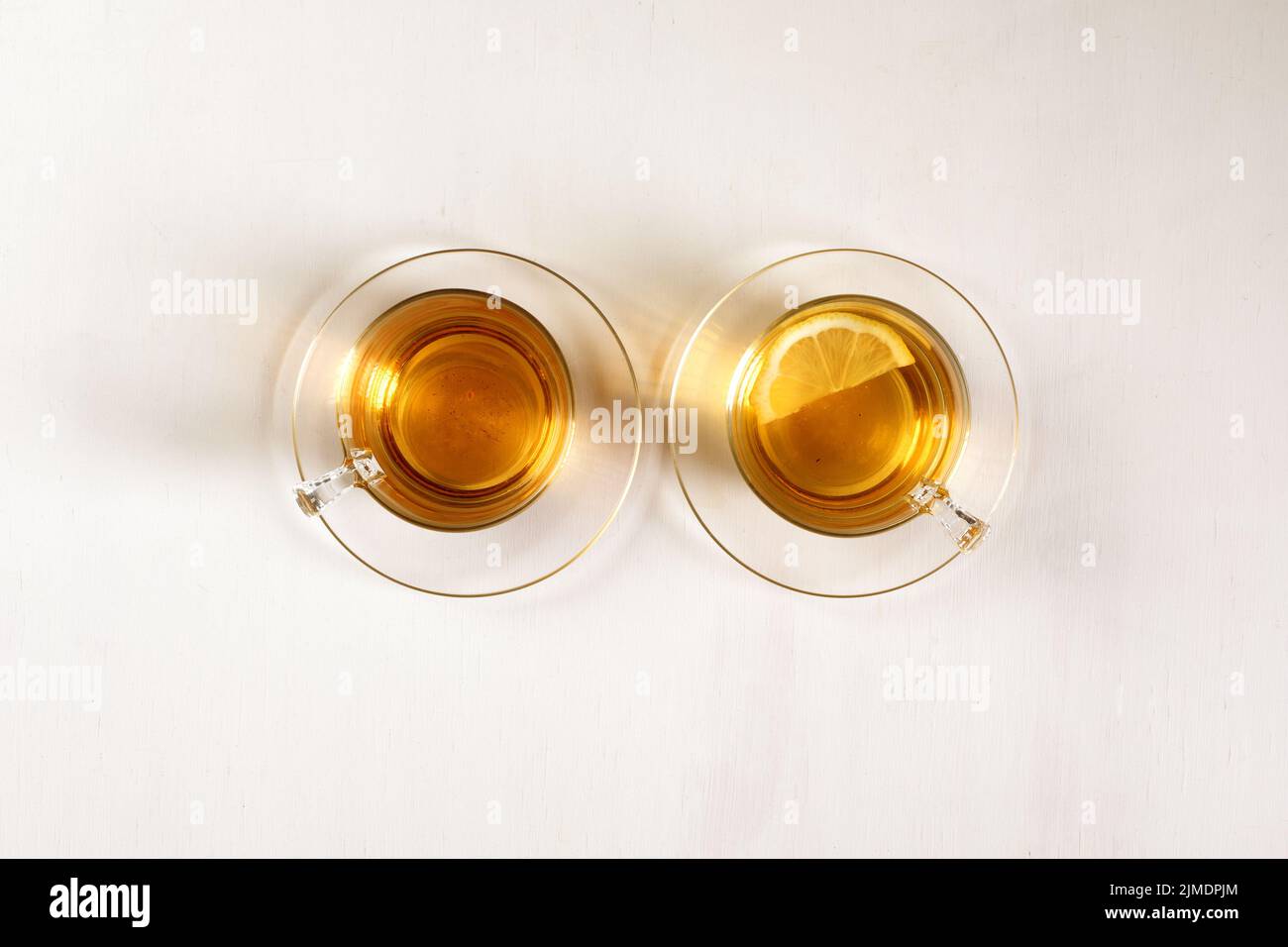 Two cups of green tea on white background, view from above Stock Photo ...