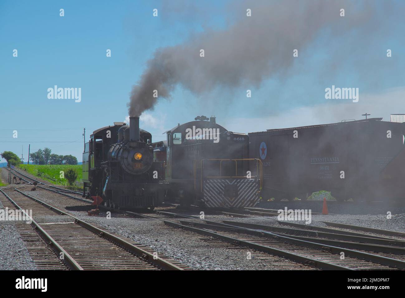 1906 Steam Locomotive and a Diesel Locomotive Seating Side by Side ...
