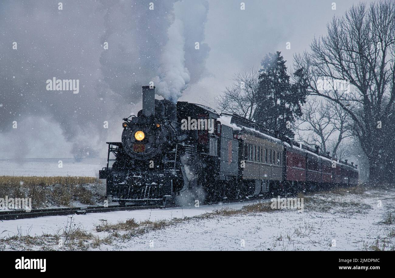 View of An Antique Restored Steam Locomotive Blowing Smoke and Steam ...