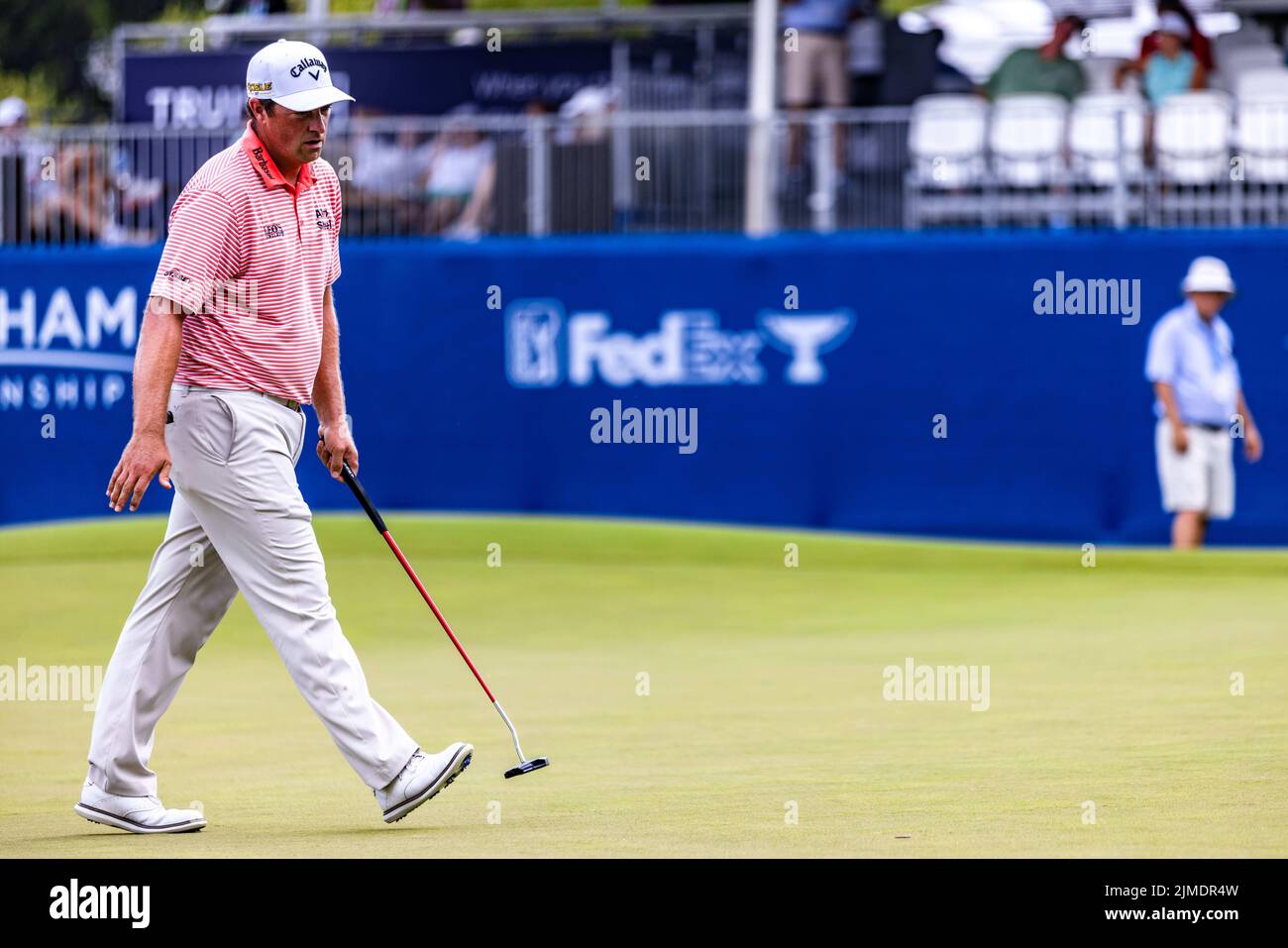 August 5, 2022: Brian Stuard checks his line for a par putt on nine in ...