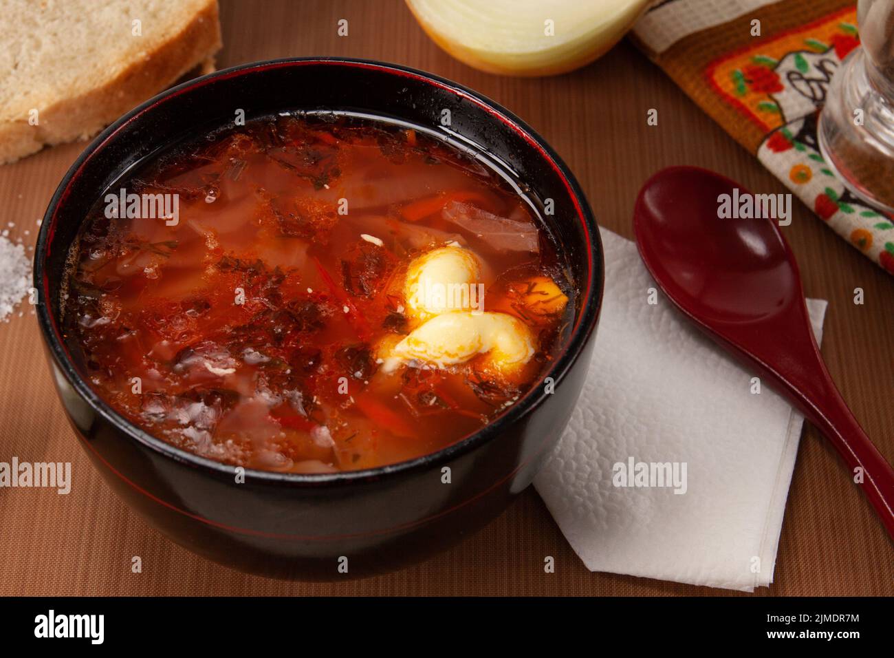 Traditional Ukrainian Russian borscht with sour cream on the bowl ...