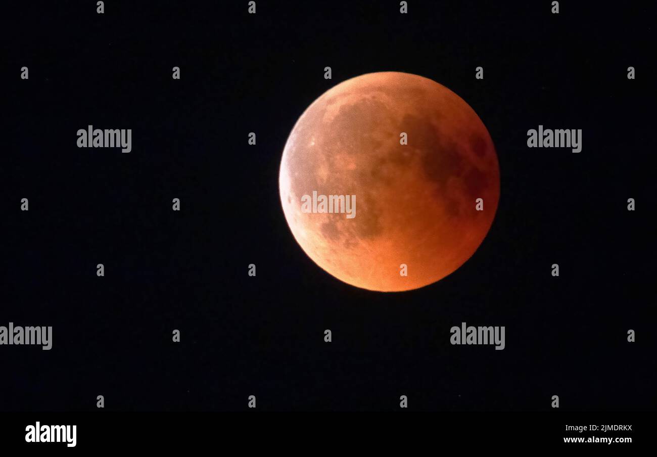 Lunar Eclipse - Moon in Red Colour Stock Photo - Alamy