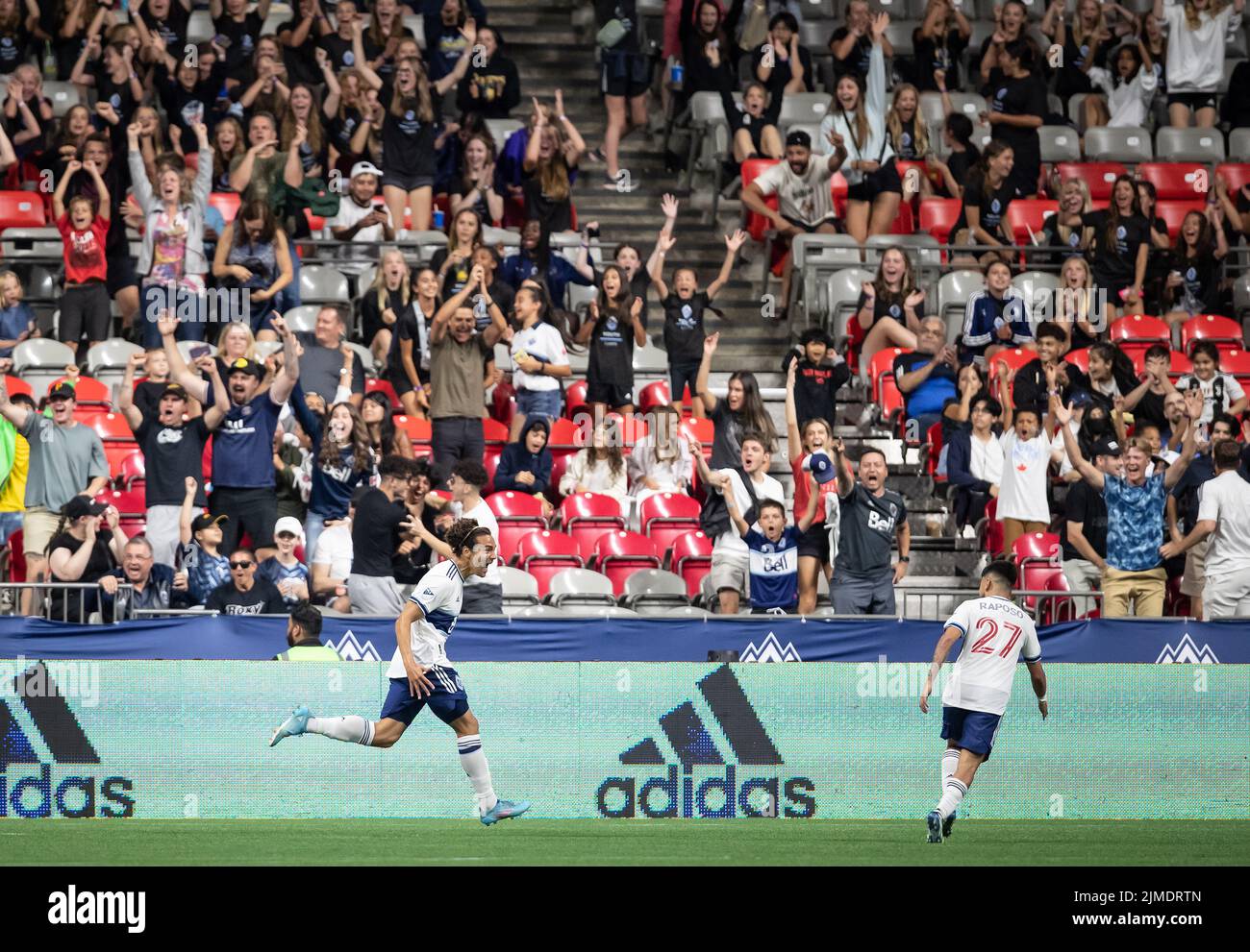 Vancouver Whitecaps' Simon Becher, left, and Ryan Raposo celebrate ...