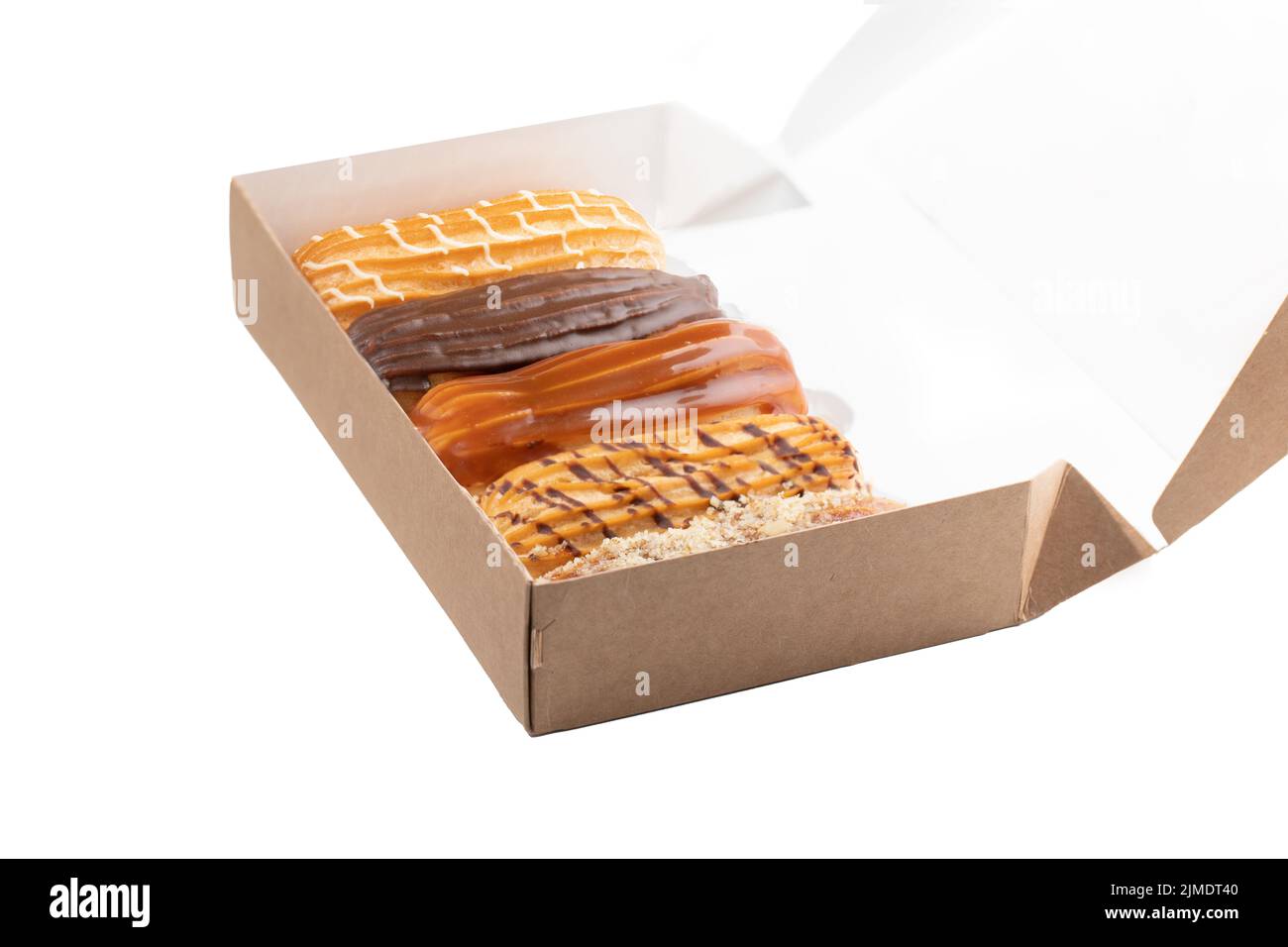 Set of five eclairs with various fillings in box isolate on white Stock ...
