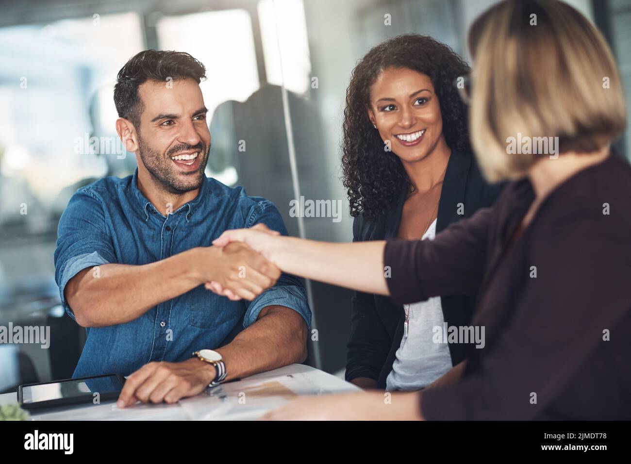 Handshake and teamwork by business people, colleagues and coworkers in ...