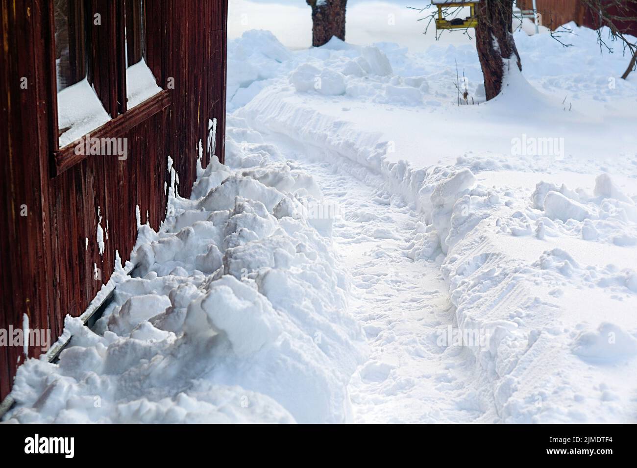 a passage dug in the snow, winter scene without people Stock Photo - Alamy