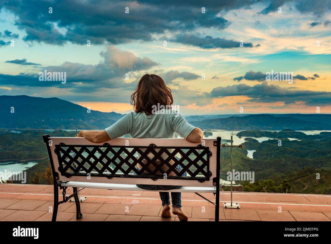Woman hiking mountain lake aerial hi-res stock photography and images ...