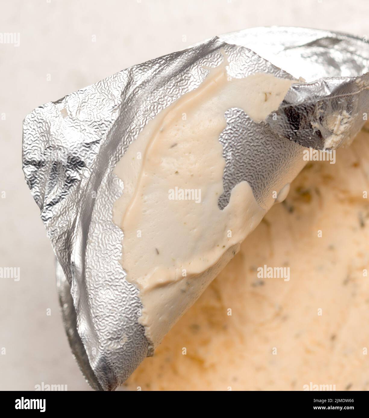 Foil wrapped cheese hi-res stock photography and images - Alamy