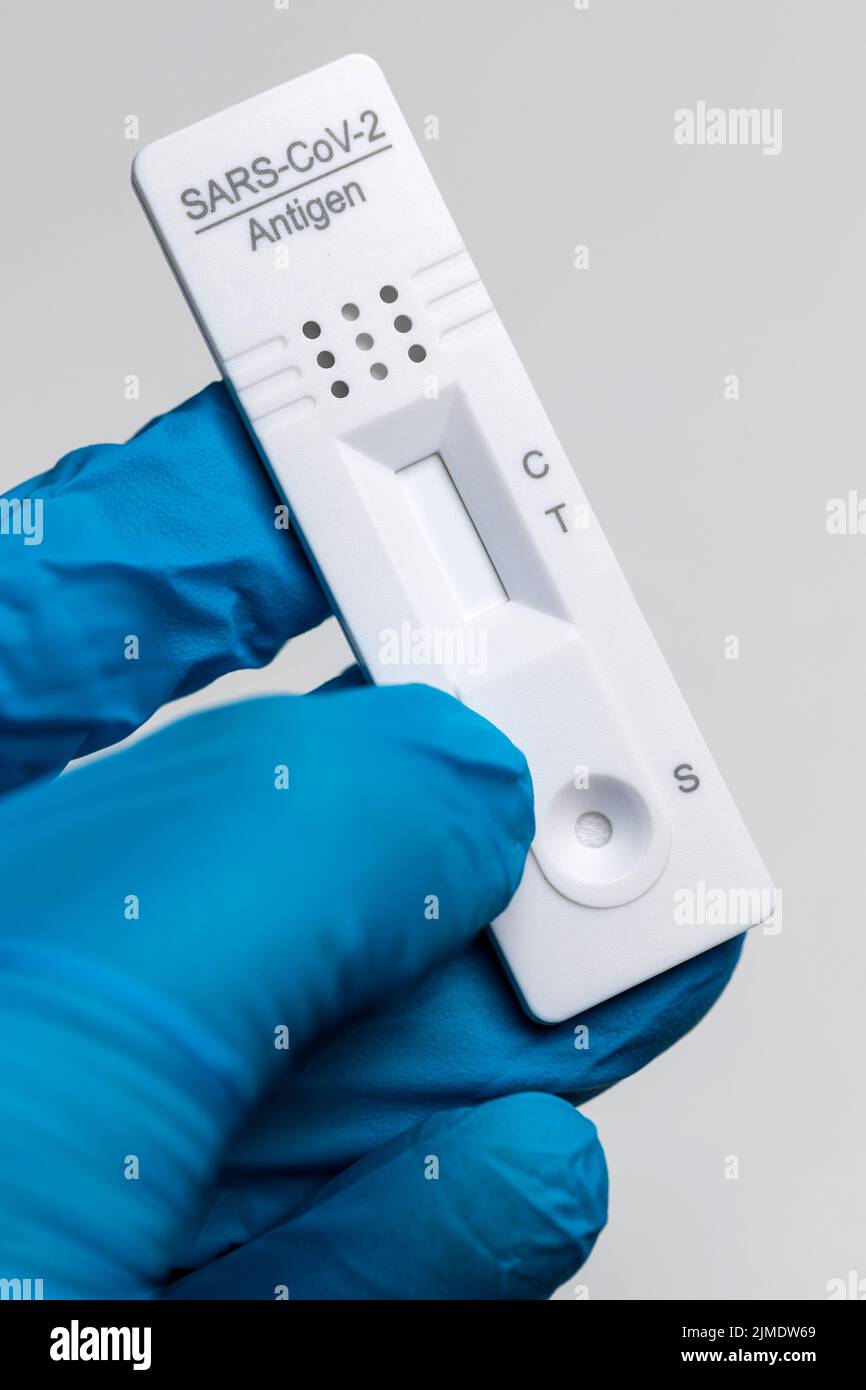 A plain perpendicular covid-19 antigen test background Stock Photo - Alamy